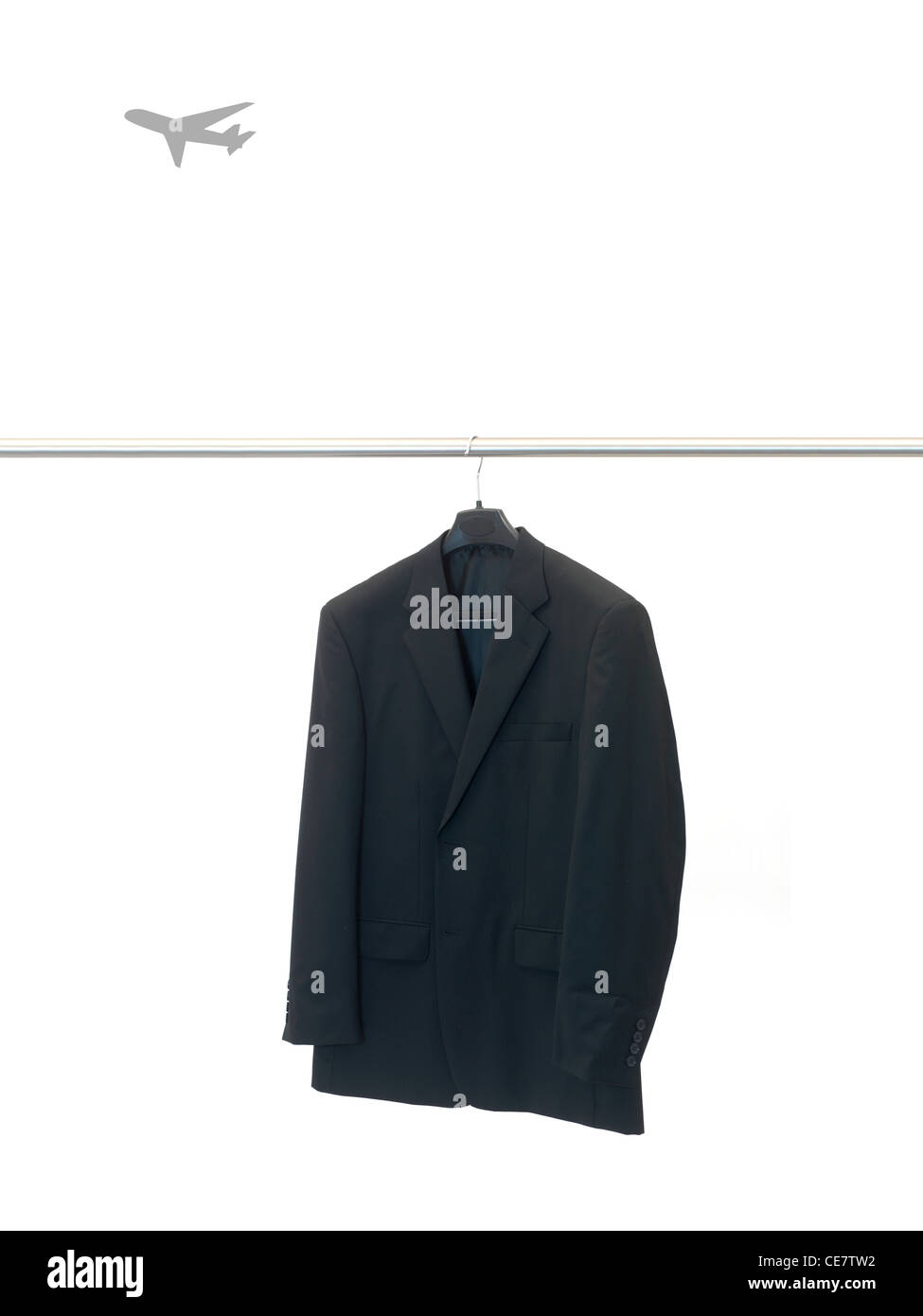 Garments hanging on coat hanger isolated against a white background ...