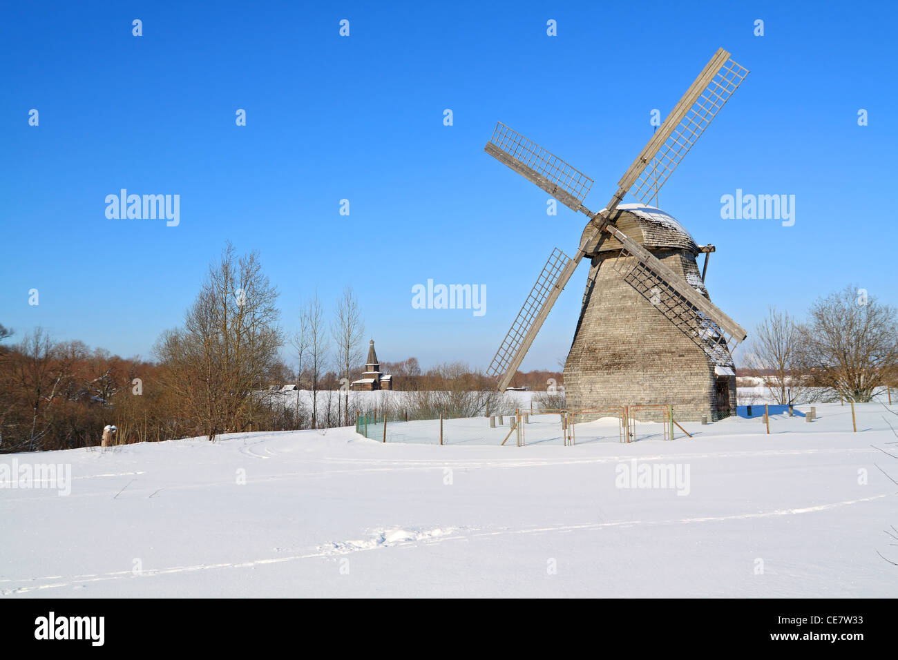 aging mill on snow field Stock Photo - Alamy