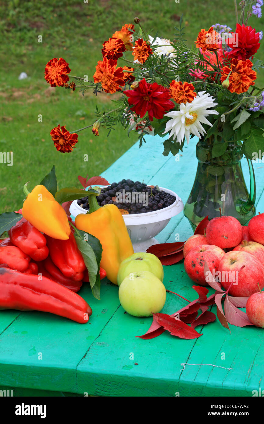 autumn still life on green table Stock Photo - Alamy
