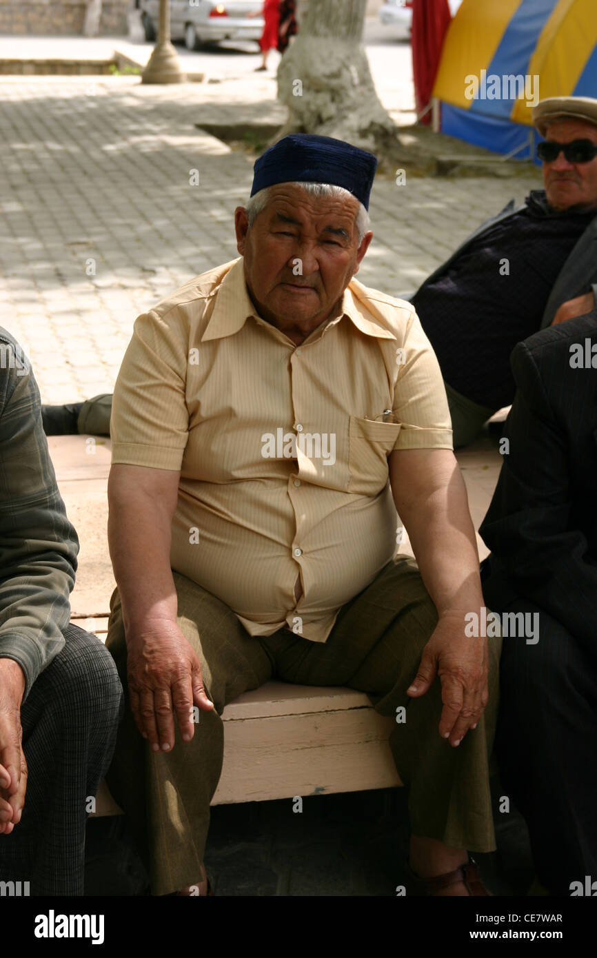 Uzbek men in traditional clothes chapan hi-res stock photography and ...
