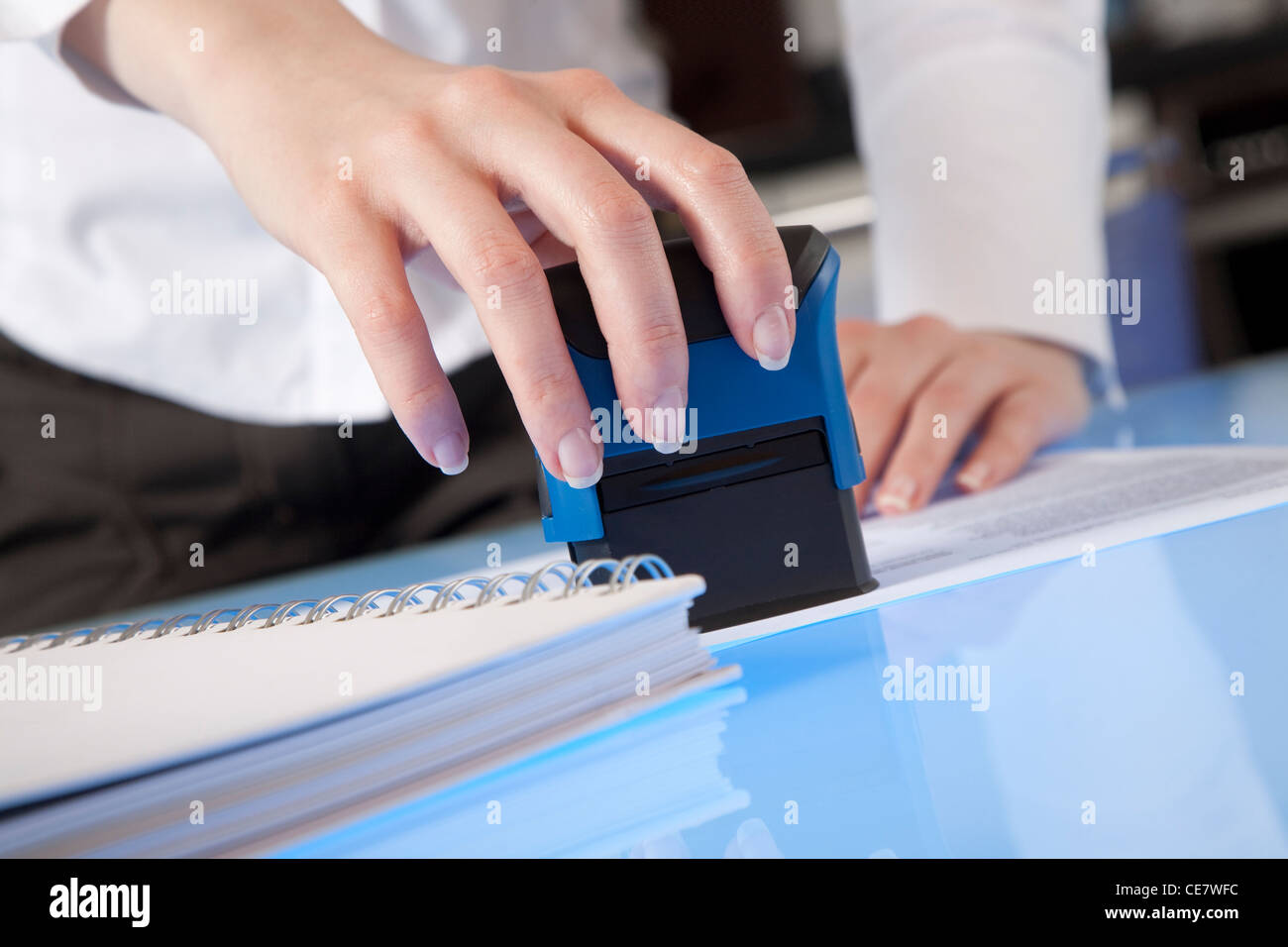 Female hand with a stamp Stock Photo - Alamy