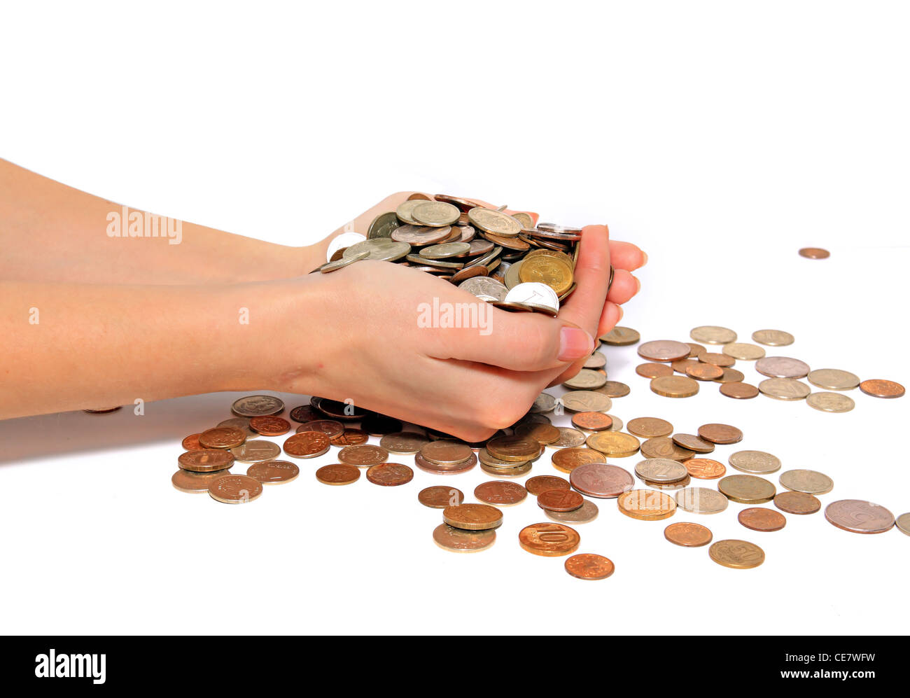 coins in hand on white background Stock Photo - Alamy