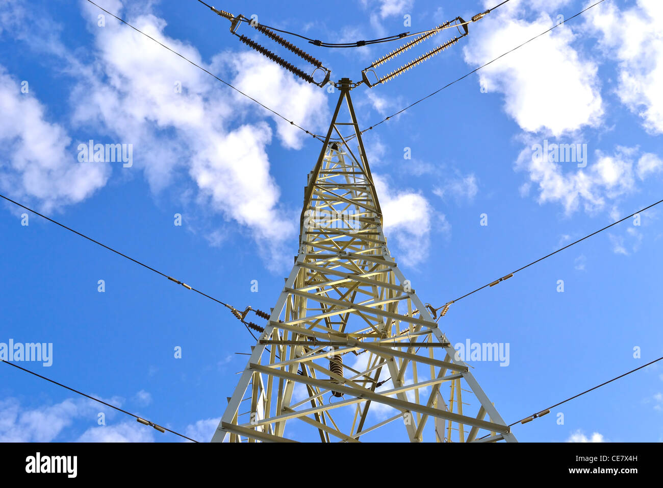 high pylon seen from below under a cloudy sky Stock Photo - Alamy