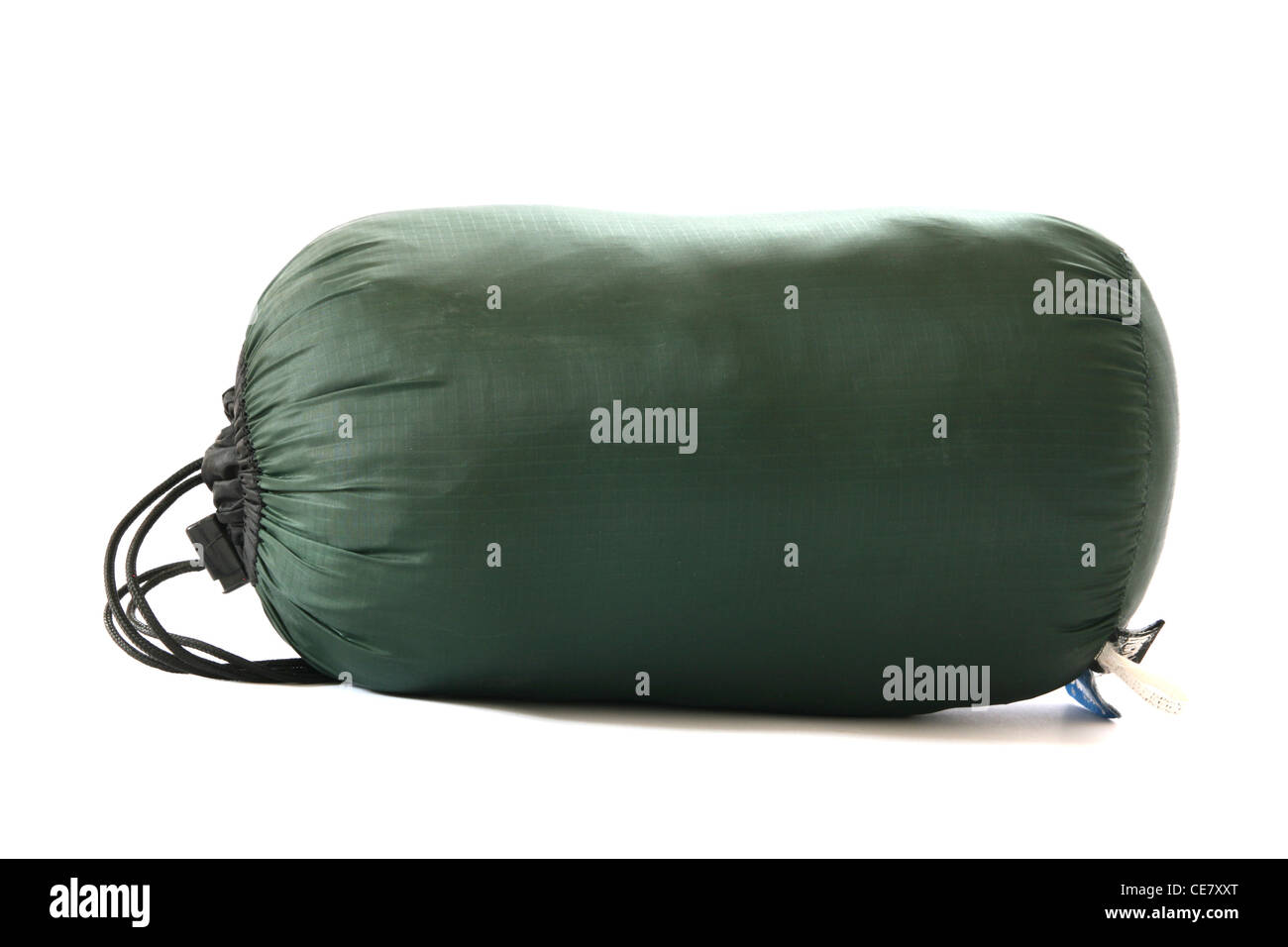 Packed sleeping-bag on white background Stock Photo - Alamy