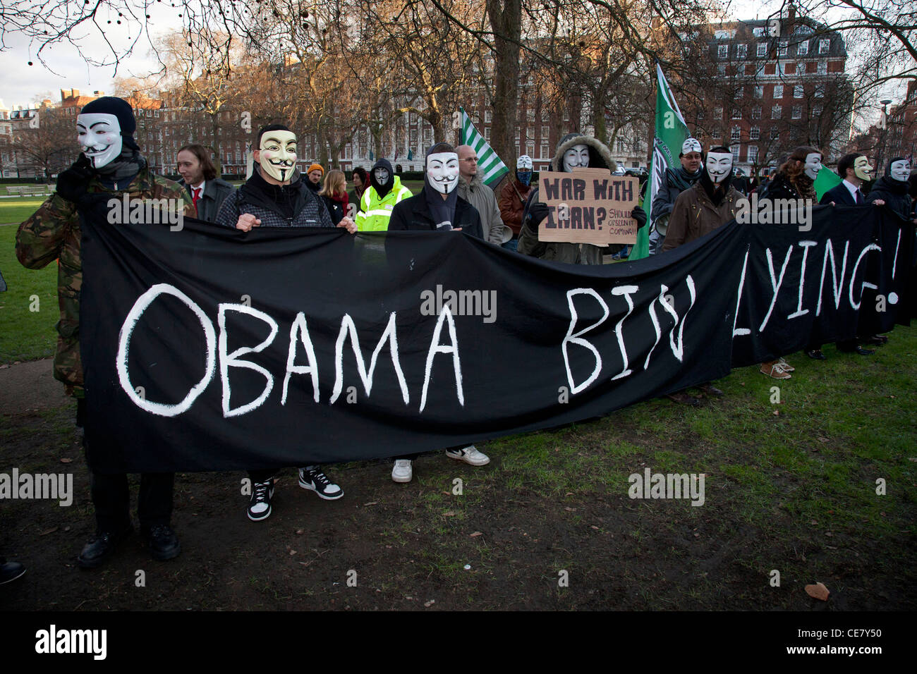 Occupy London protesters in anonymous masks join in the rally. Stop The ...