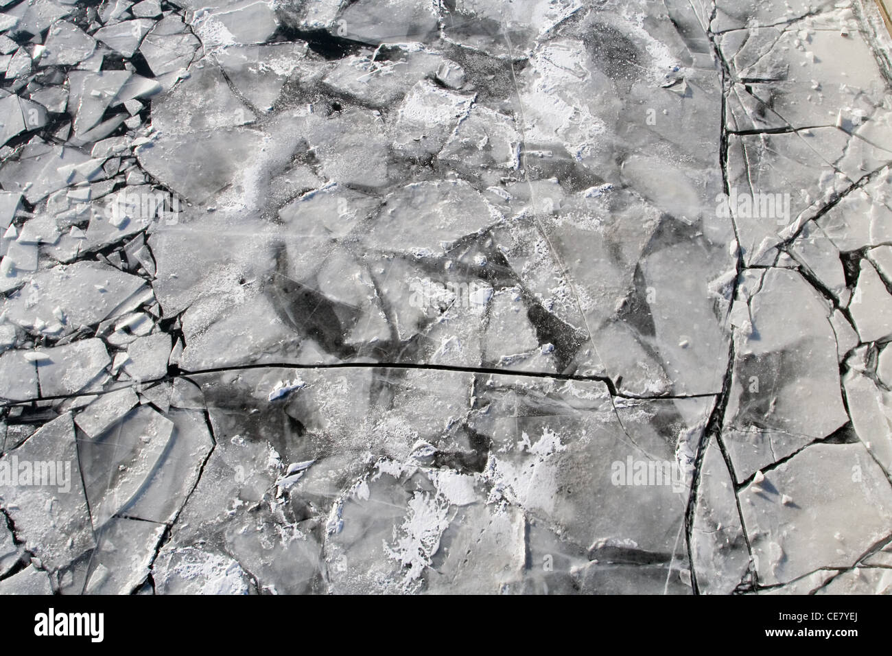 Broken ice on a river Stock Photo - Alamy