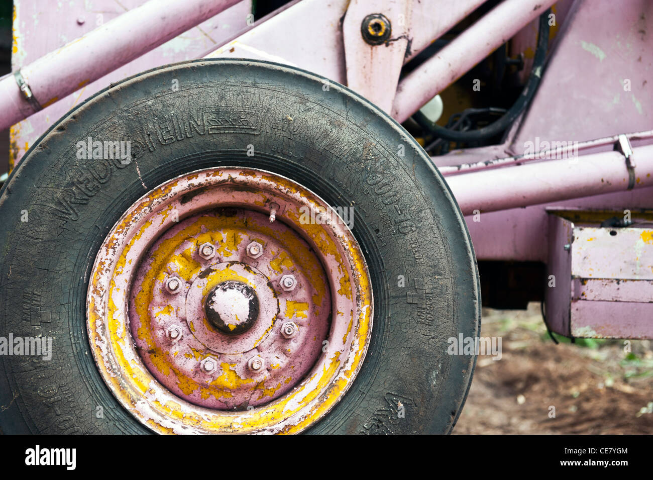 Pink tractor wheel Stock Photo - Alamy