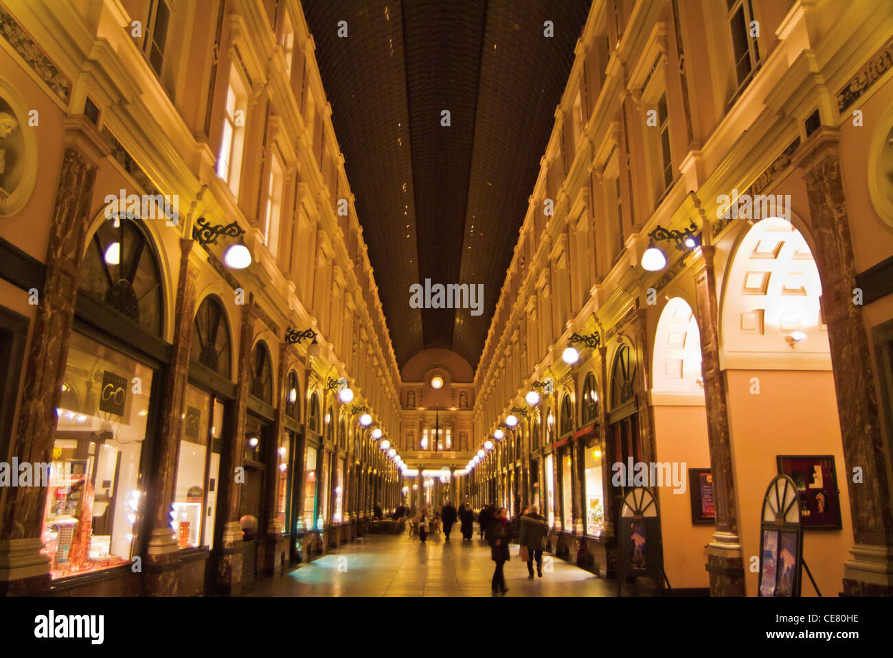 Galeries St Hubert at night a covered arcade with shops and cafes ...