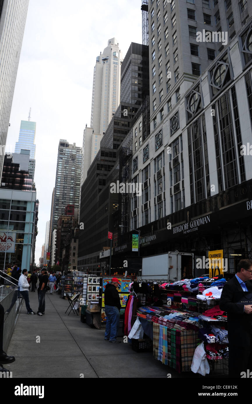 Sidewalk portrait skyscrapers street-traders market stalls selling ...