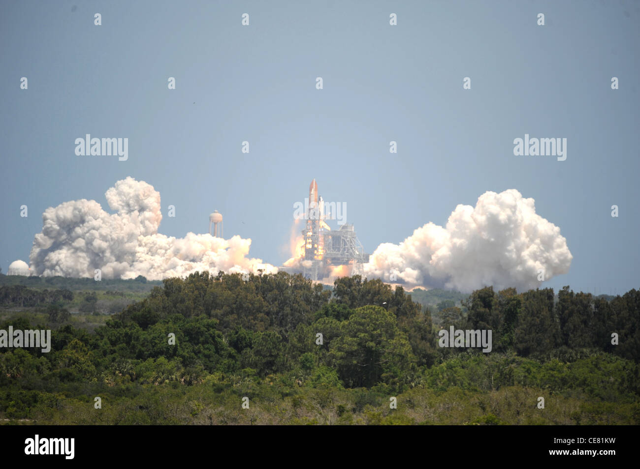 The Space Shuttle Atlantis lifts off from the Kennedy Space Center on ...