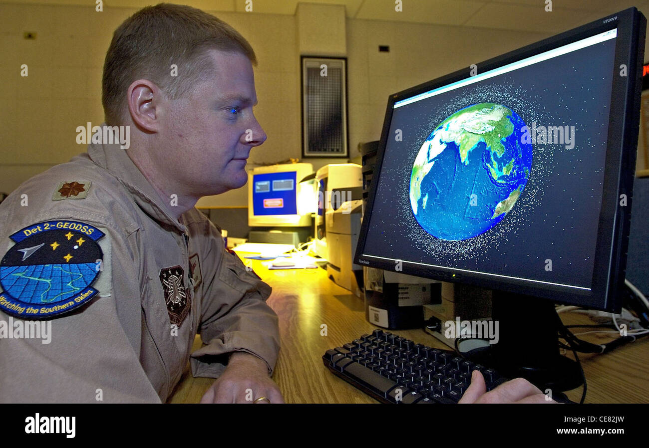 Maj. Jay Fulmer uses space and missile analysis software to track known ...