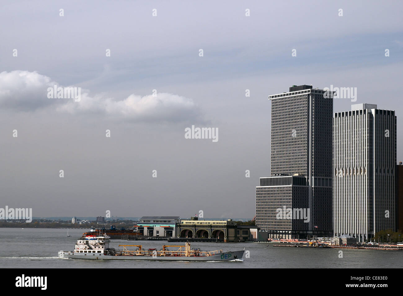 A boat passes by the Staten Island Ferry Terminal in Lower Manhattan ...
