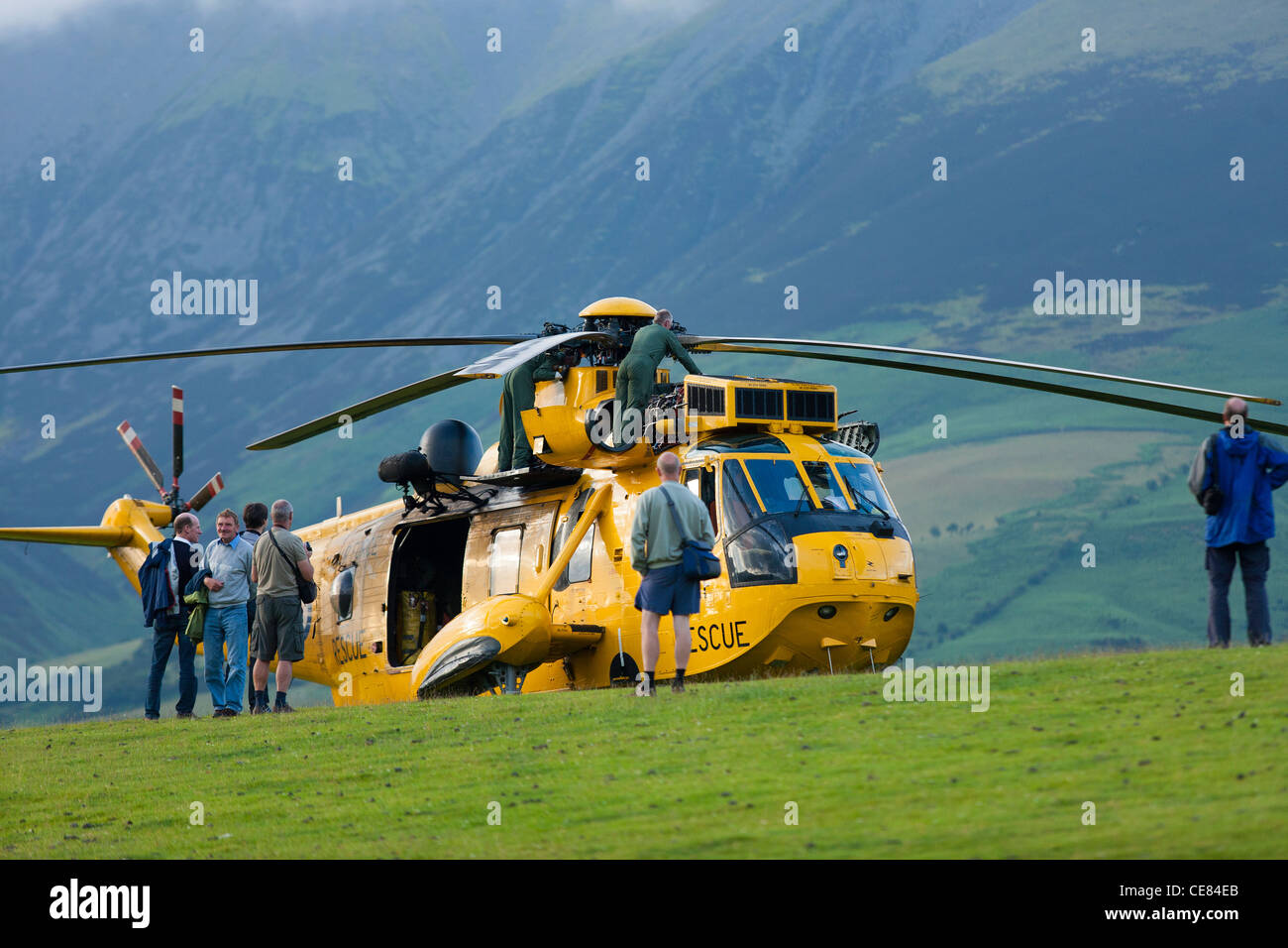 An RAF rescue helicopter being repaired after It had landed with a ...