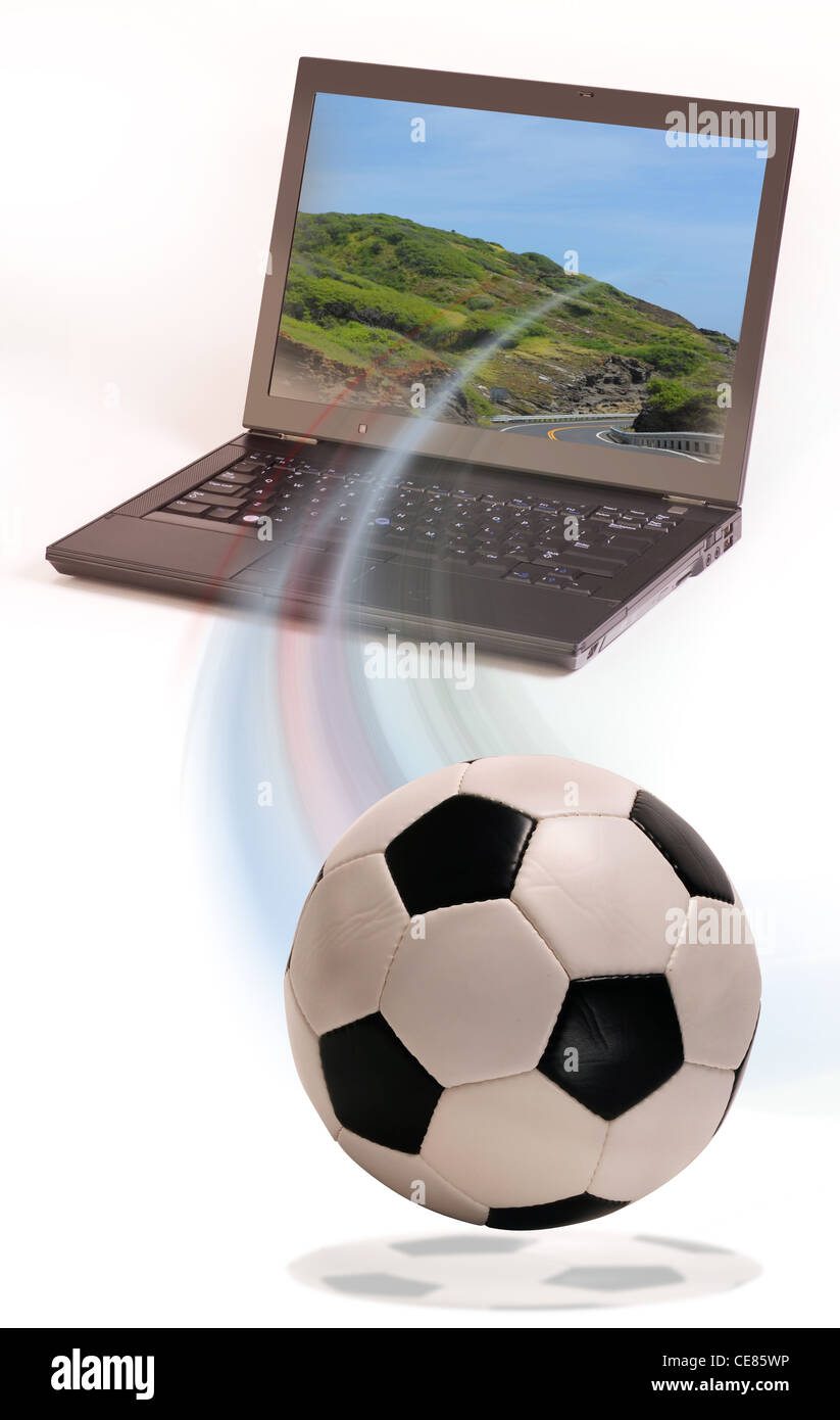 Soccer ball and your computer Stock Photo - Alamy