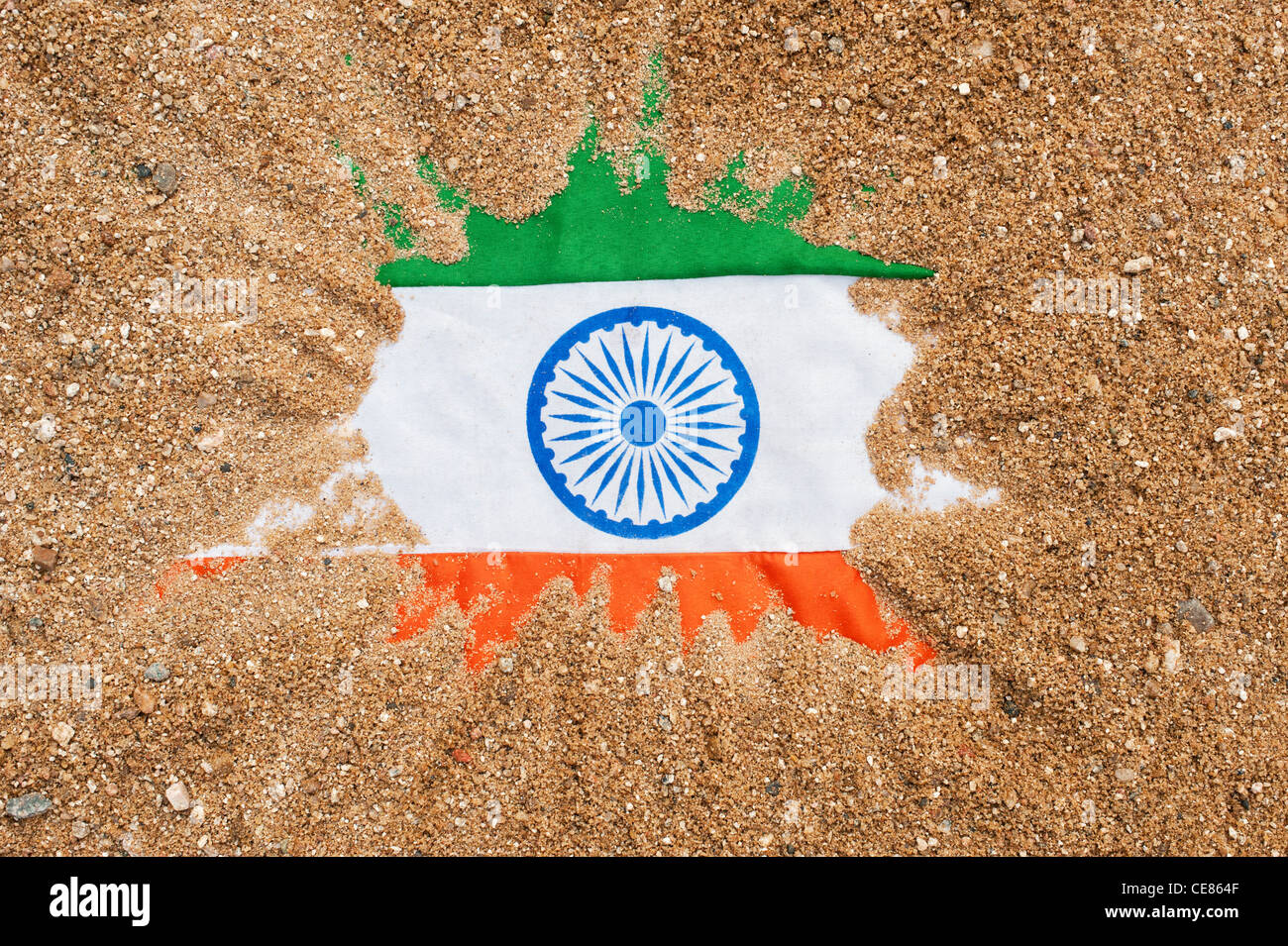 Indian flag showing through sand Stock Photo - Alamy
