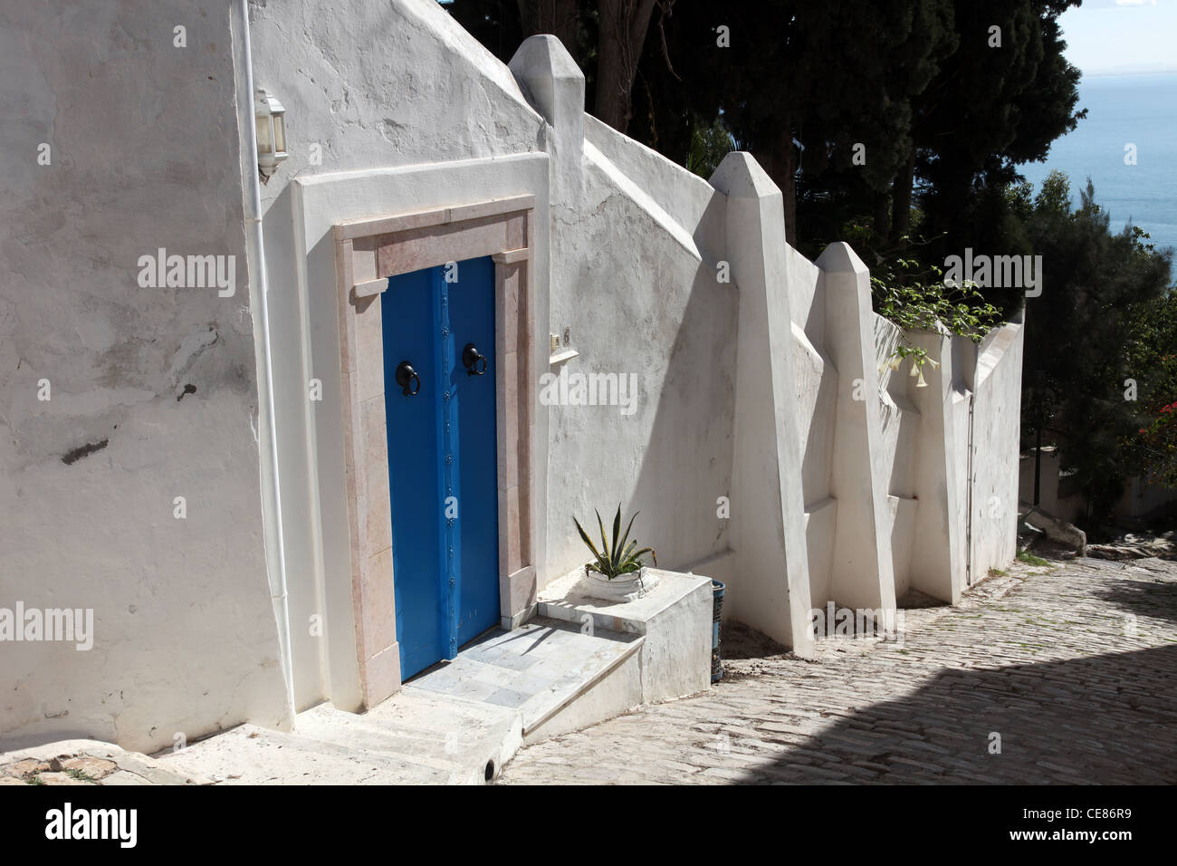 Sidi Bou Said - typical building with white walls, blue doors and ...