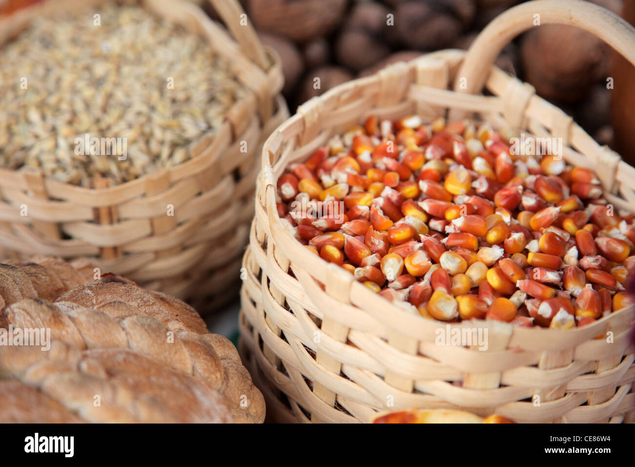 Basket with wheat and maize Stock Photo - Alamy