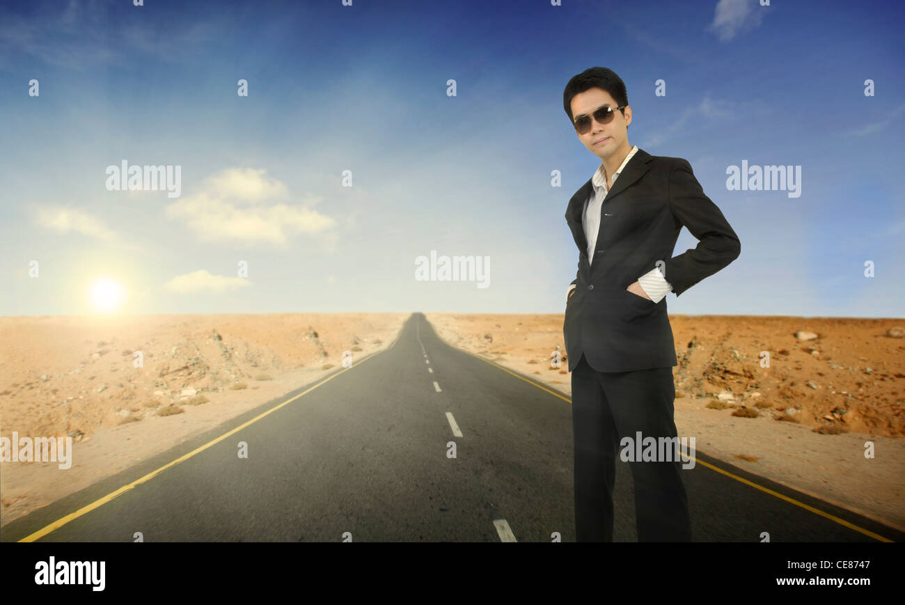 asian man on a lone road Stock Photo - Alamy