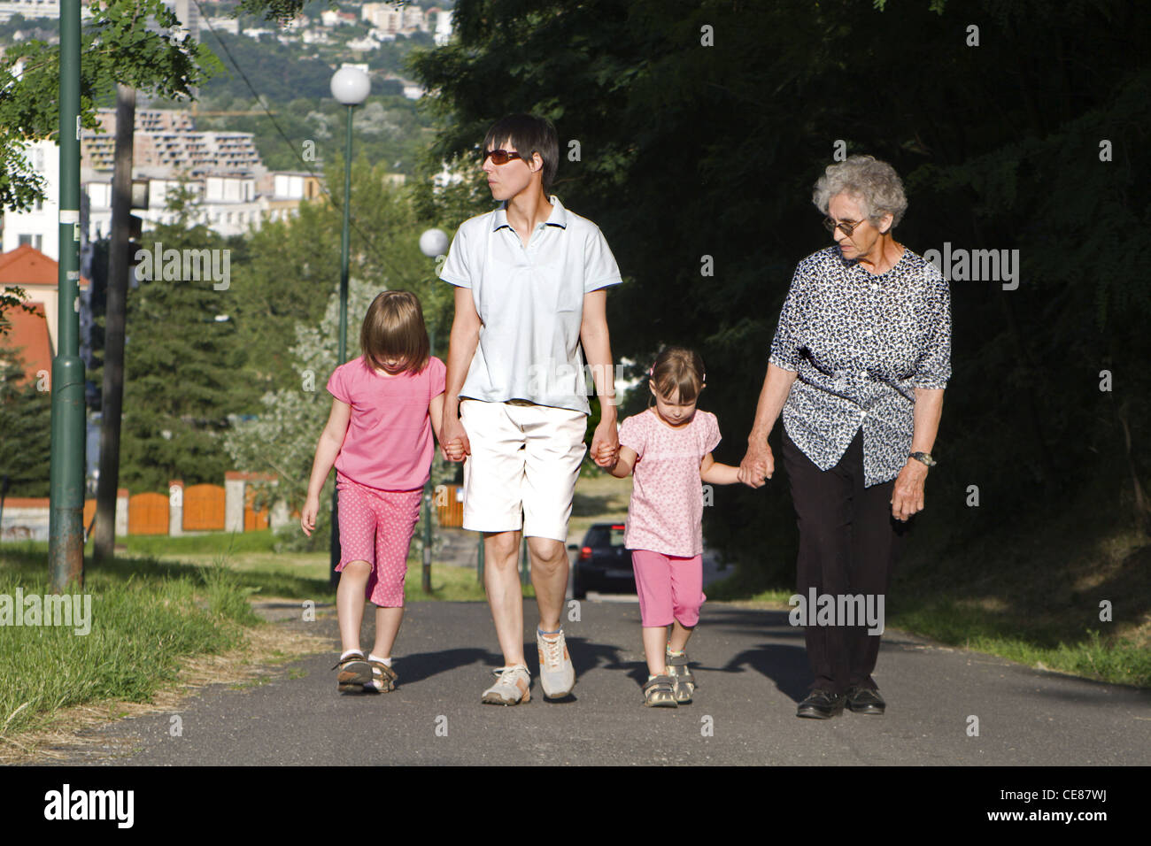 more generations family on the walk Stock Photo - Alamy