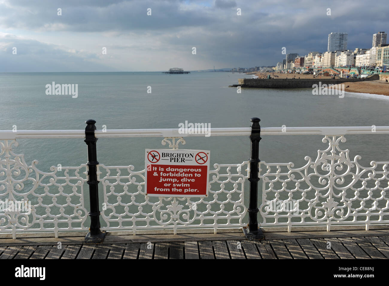 Warning sign on Brighton Palace Pier Stock Photo - Alamy