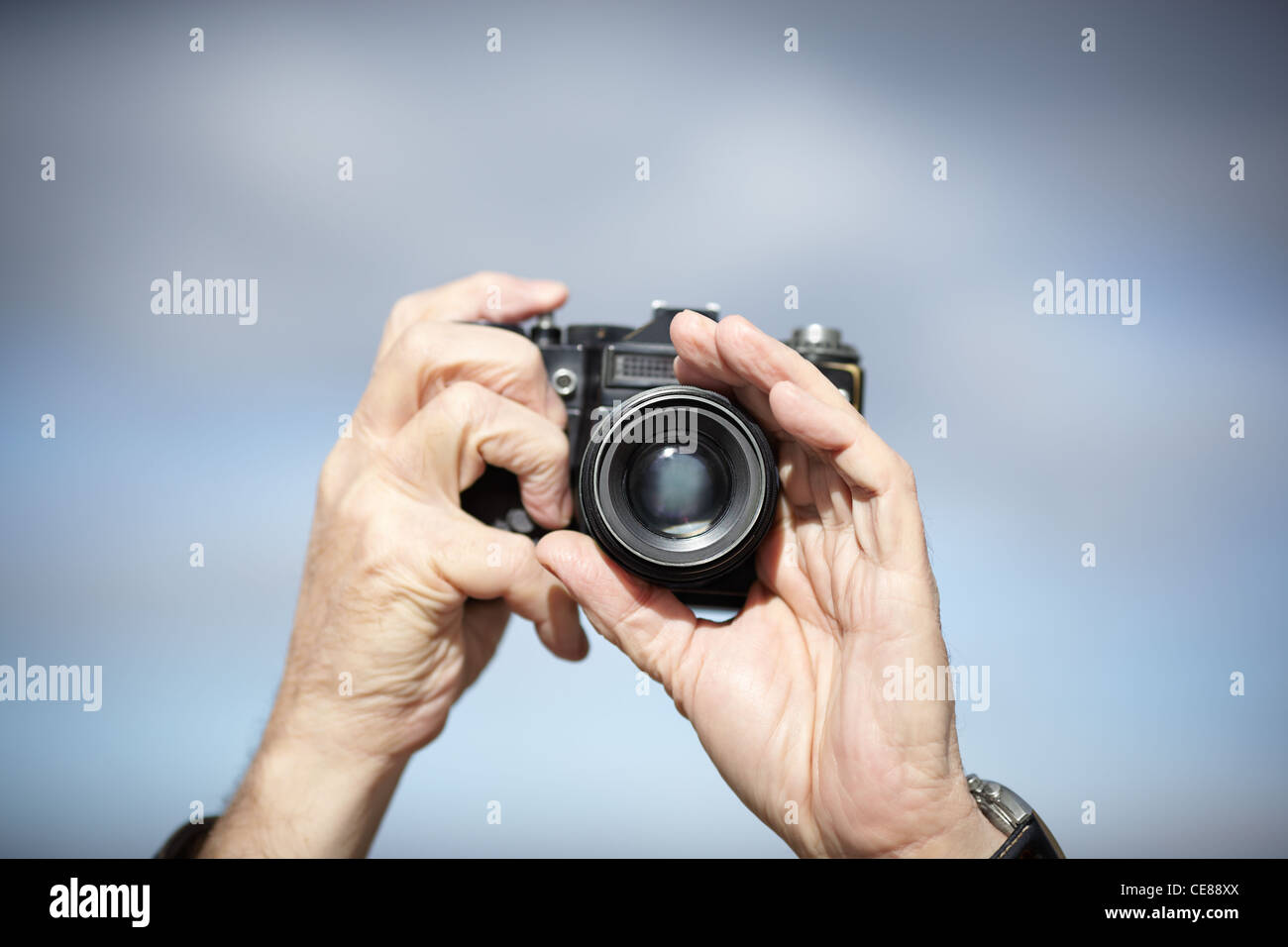 vintage old camera and hands Stock Photo - Alamy