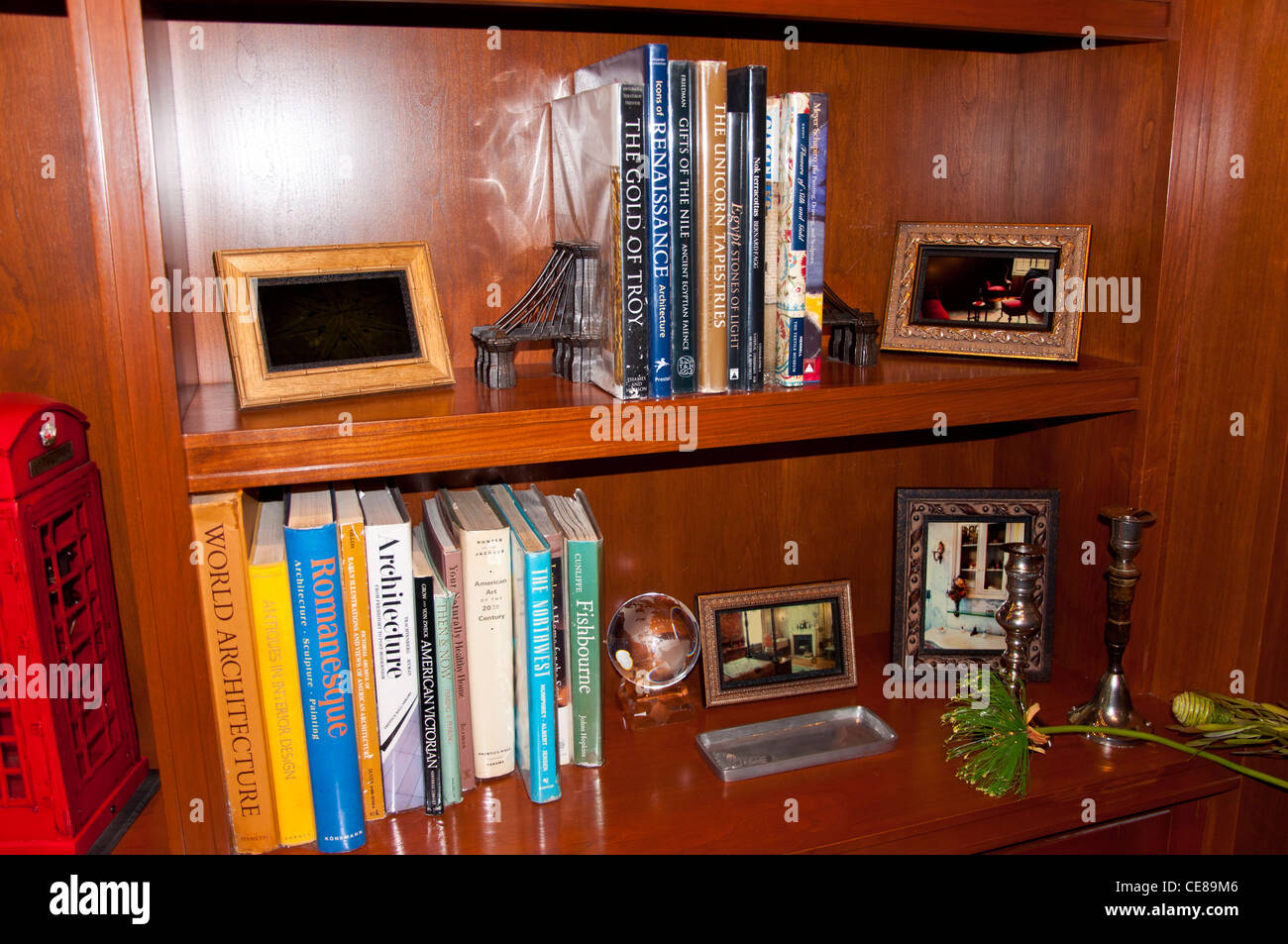 Shells with books and souvenirs Stock Photo - Alamy