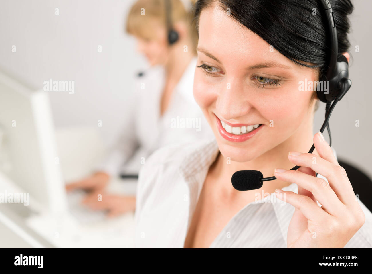 Customer service team woman call center smiling operator phone headset Stock Photo - Alamy
