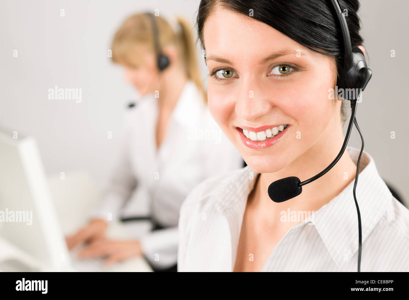 Customer service team woman call center smiling operator phone headset Stock Photo - Alamy