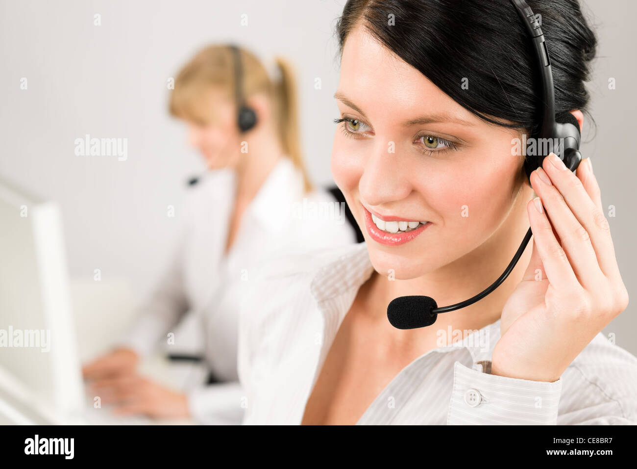 Customer service team woman call center smiling operator phone headset Stock Photo - Alamy