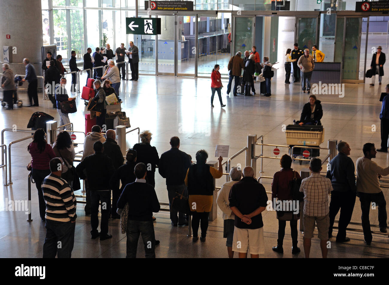 People waiting for passengers in the arrivals hall, Terminal 3, Malaga ...