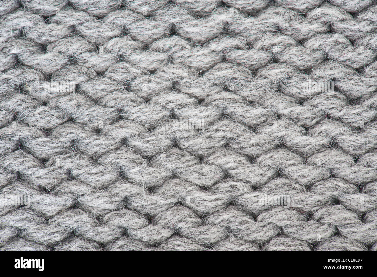 Gray knitted wool background closeup Stock Photo - Alamy