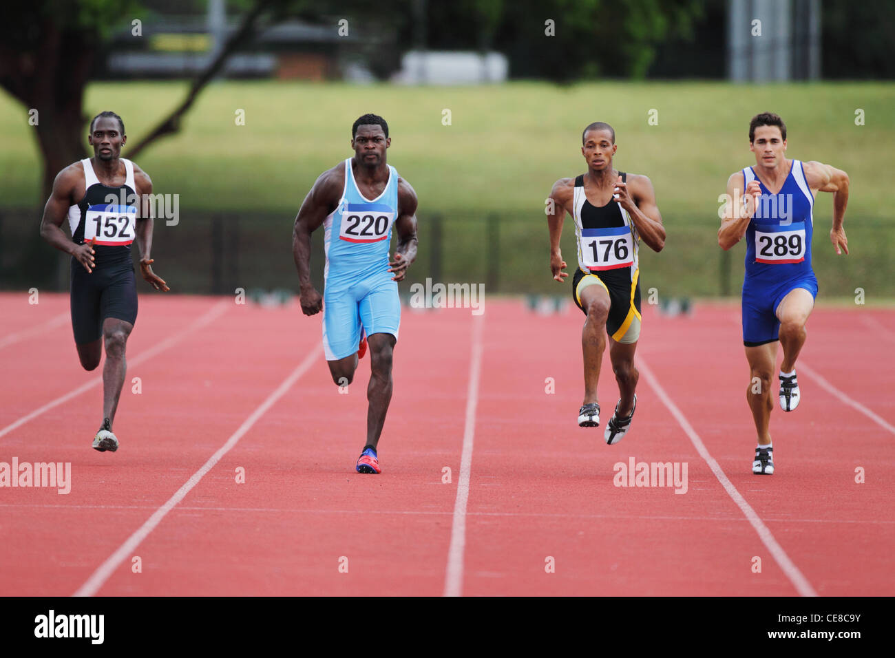 Runners Racing, Front View Stock Photo - Alamy