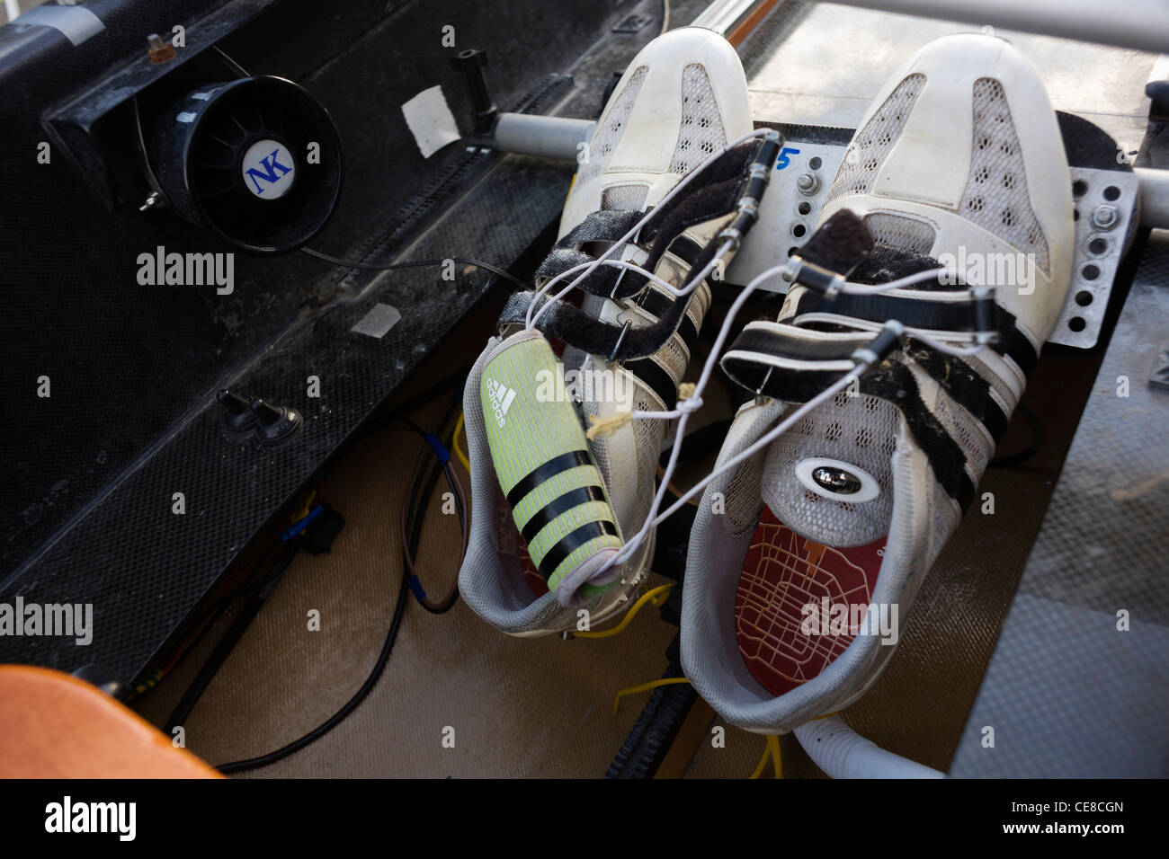 A pair of trainers attached to the foot plate on boat belonging to the ...
