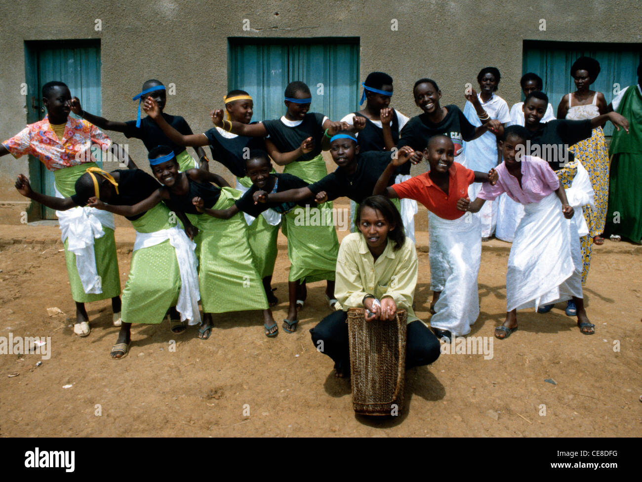 Girls performing a traditional dance to the beat of a drum in Kigali ...