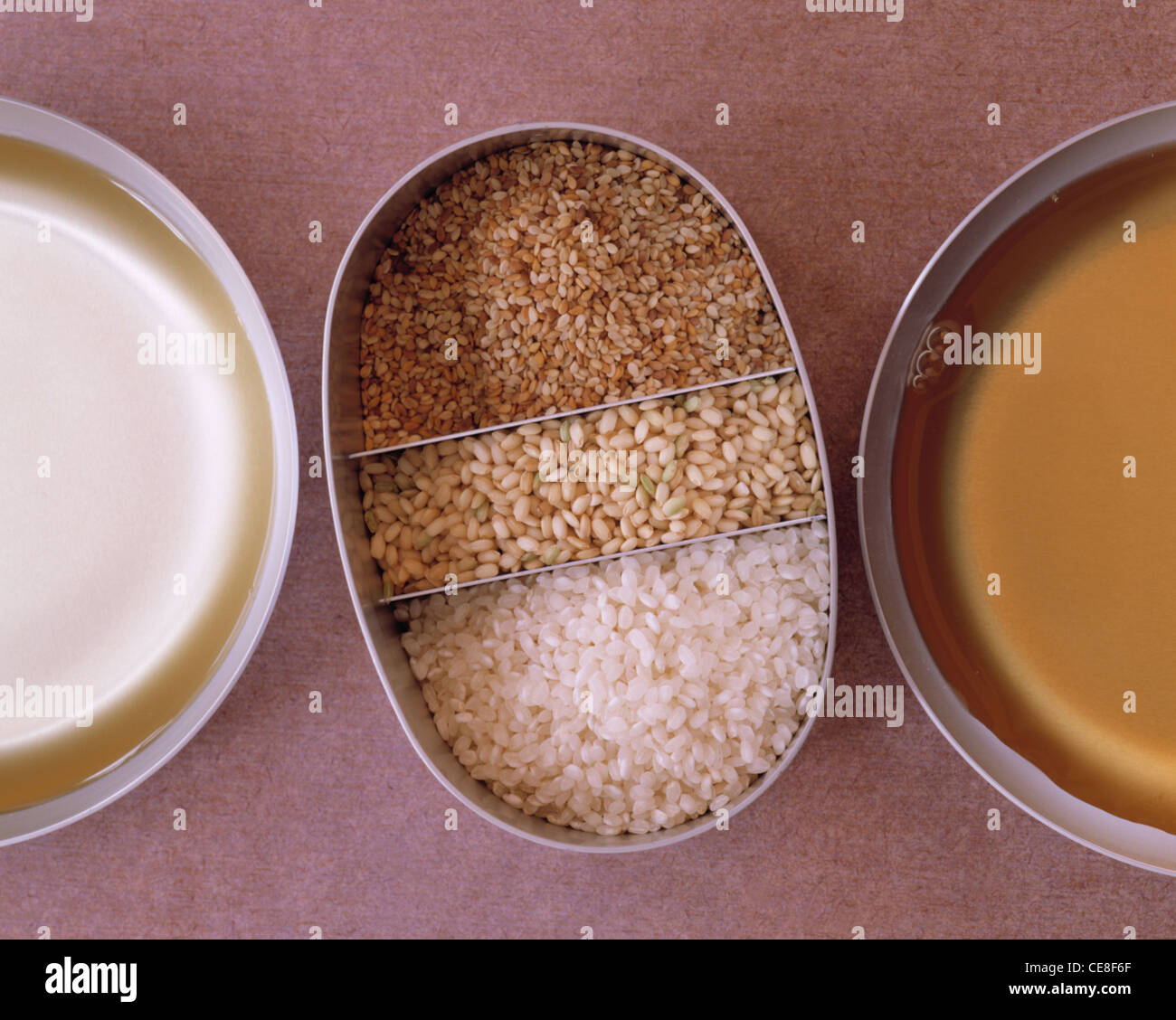 Still Sushi: Rice and sesame in a bento box Stock Photo - Alamy