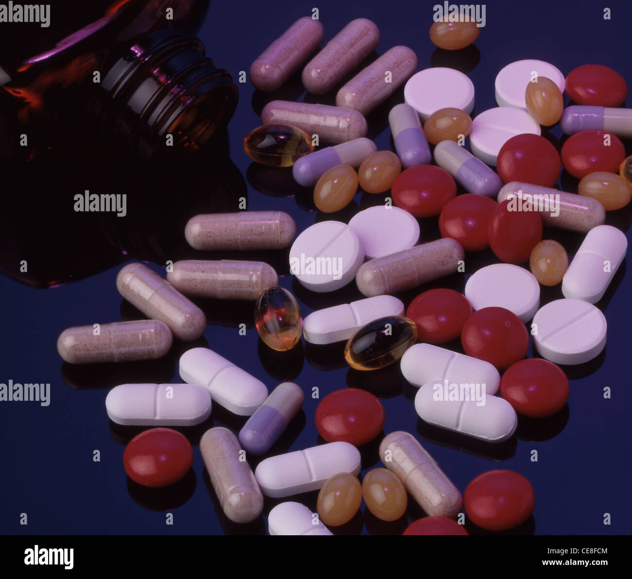 Tablets spilling from container vitamin hi-res stock photography and ...