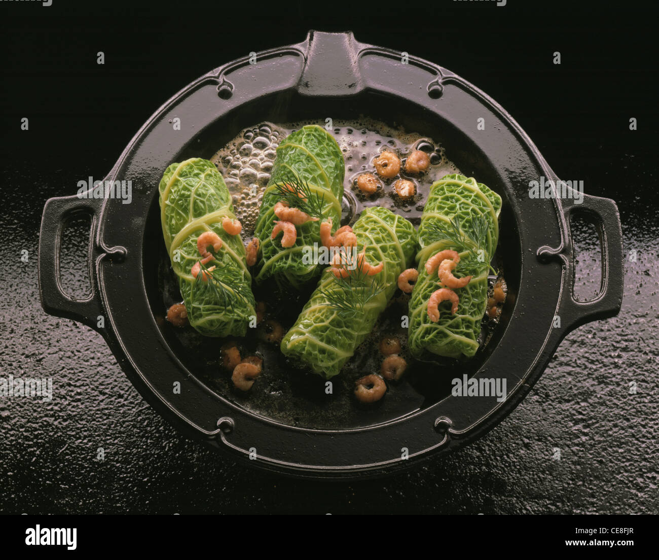 Savoy cabbage roulade with Shrimp filling Stock Photo - Alamy