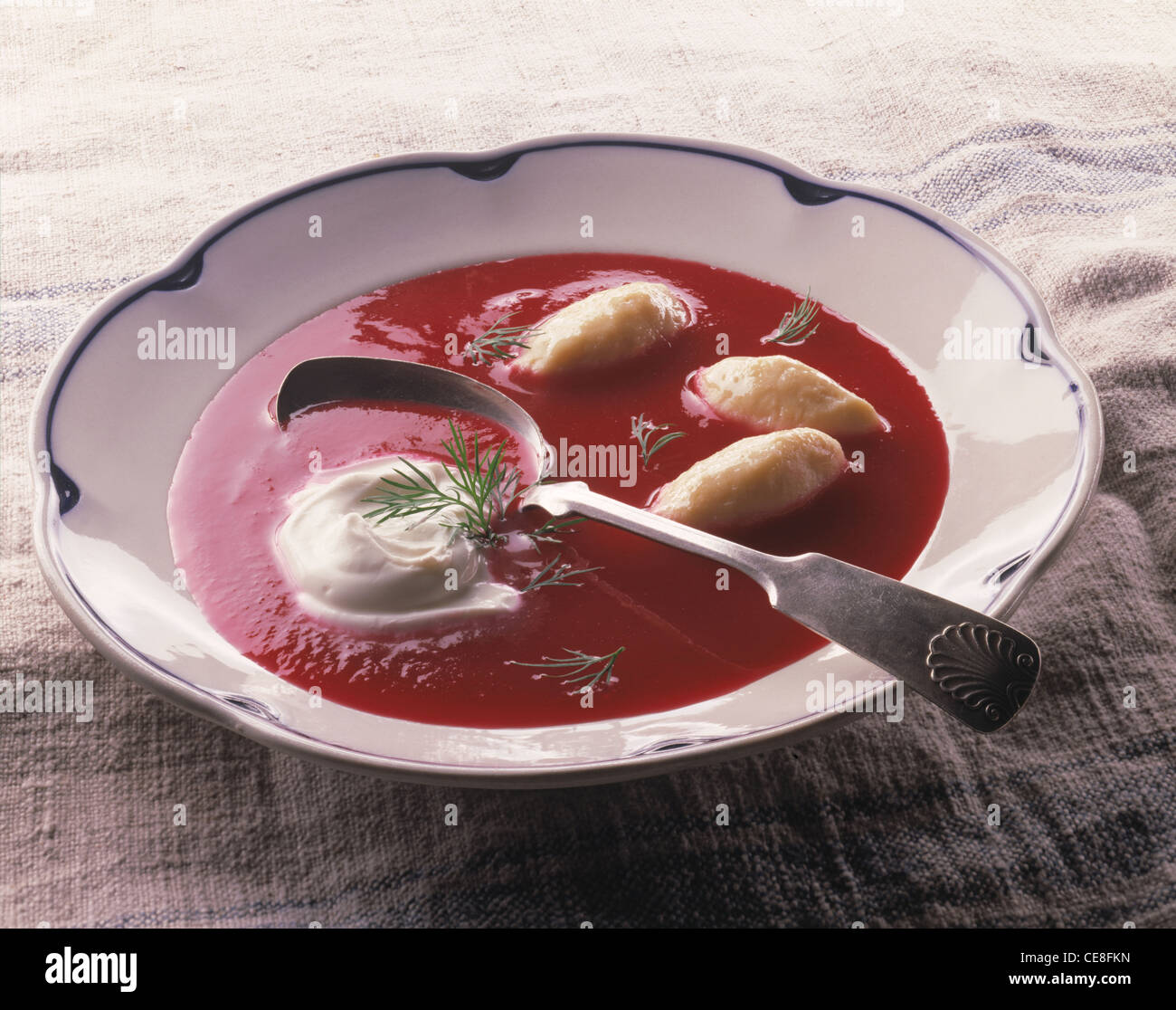 Beet root soup horseradish dumplings hi-res stock photography and ...