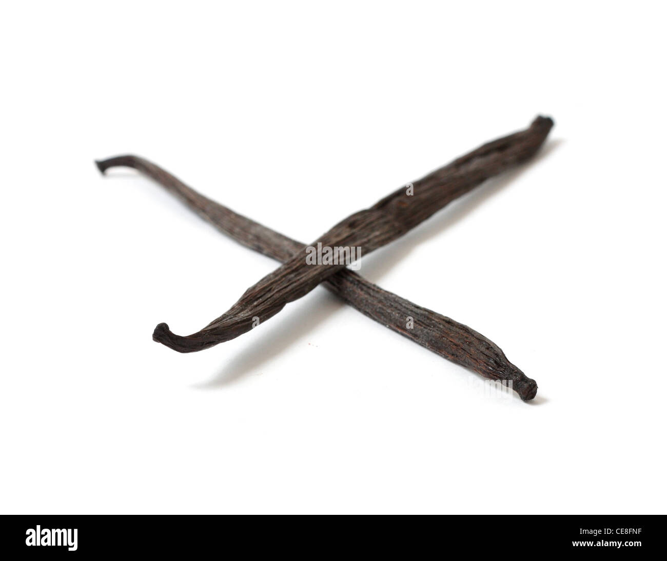 Vanilla sticks isolated on a white background Stock Photo - Alamy
