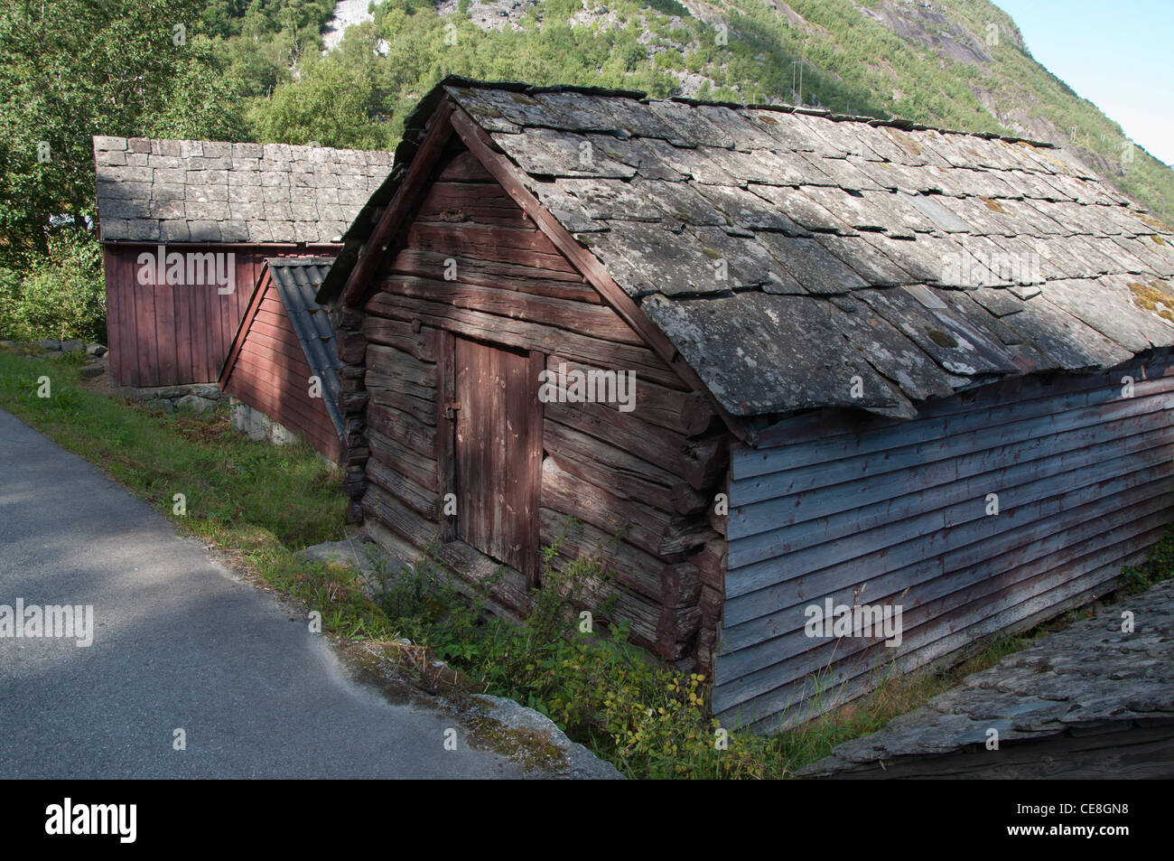 Norwegian timber constructed boathouses with stone tile roof ...