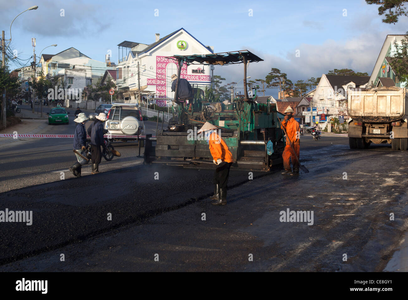 Workers Tarmacing Road in Dalat Stock Photo - Alamy