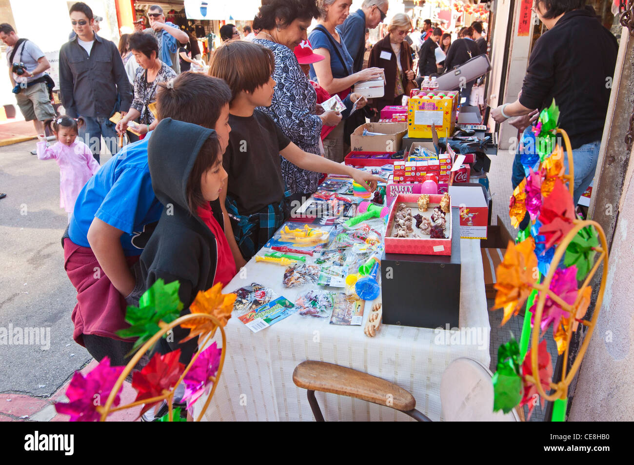 Kids and people buying toys and gifts in Chinatown Stock Photo - Alamy
