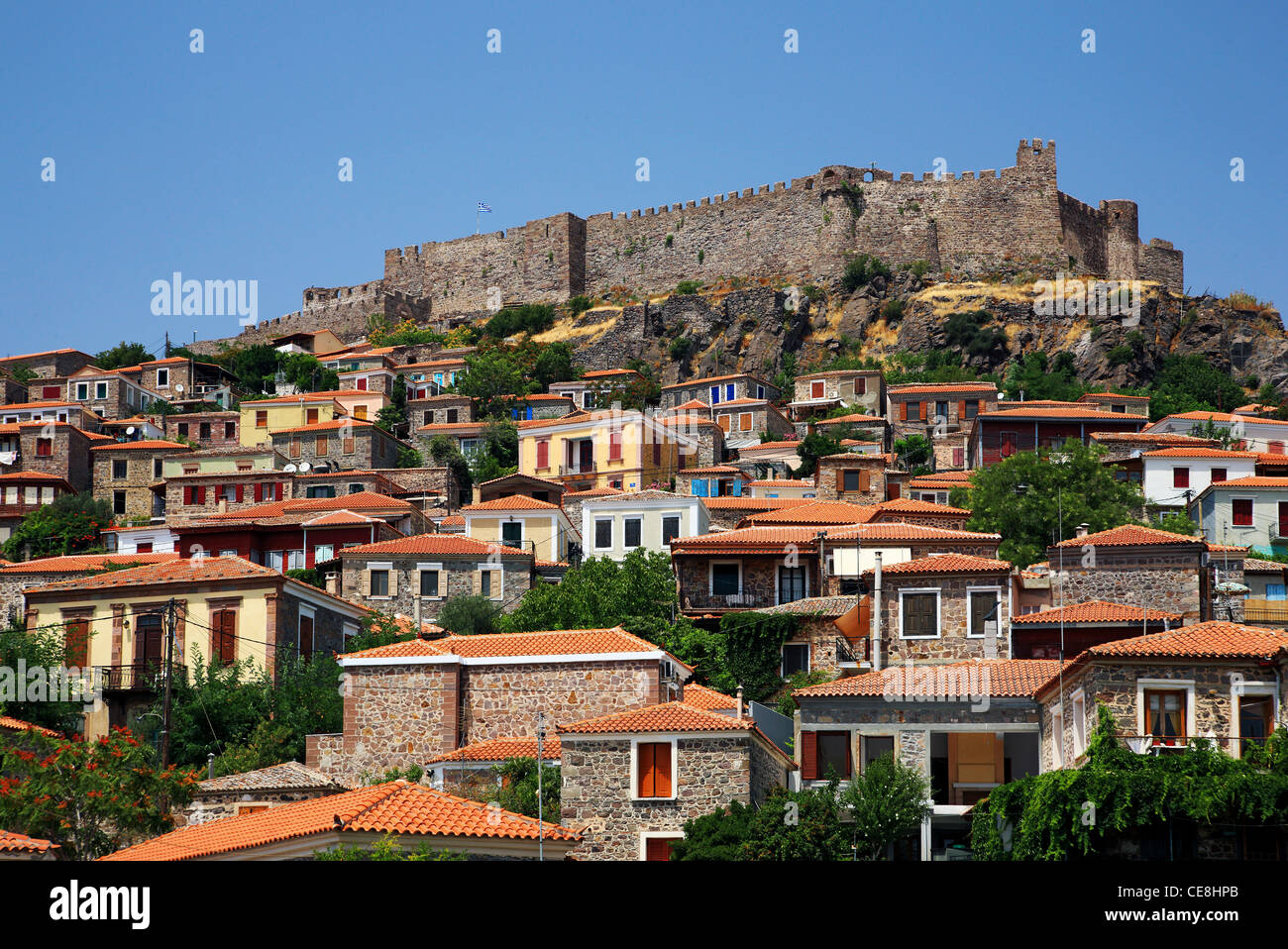 Partial view of beautiful Molyvos town with its medieval castle on top ...