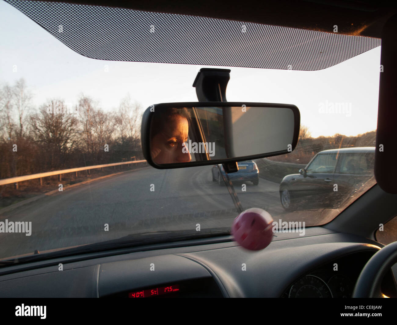 woman driver,reflection in the rear view mirror Stock Photo - Alamy