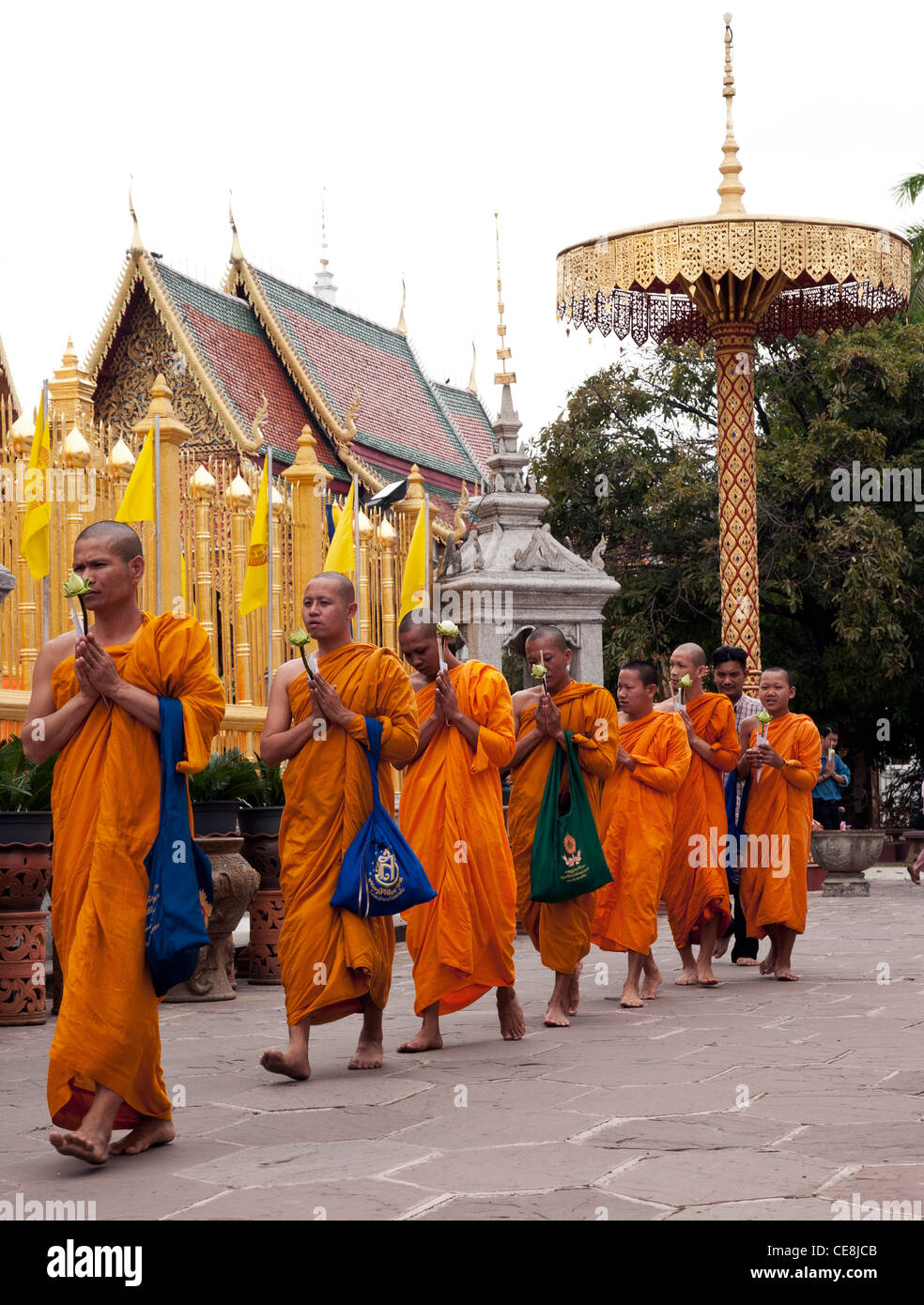 Buddhist monks processing around the Wat Pharathat Doi Suthep temple in ...