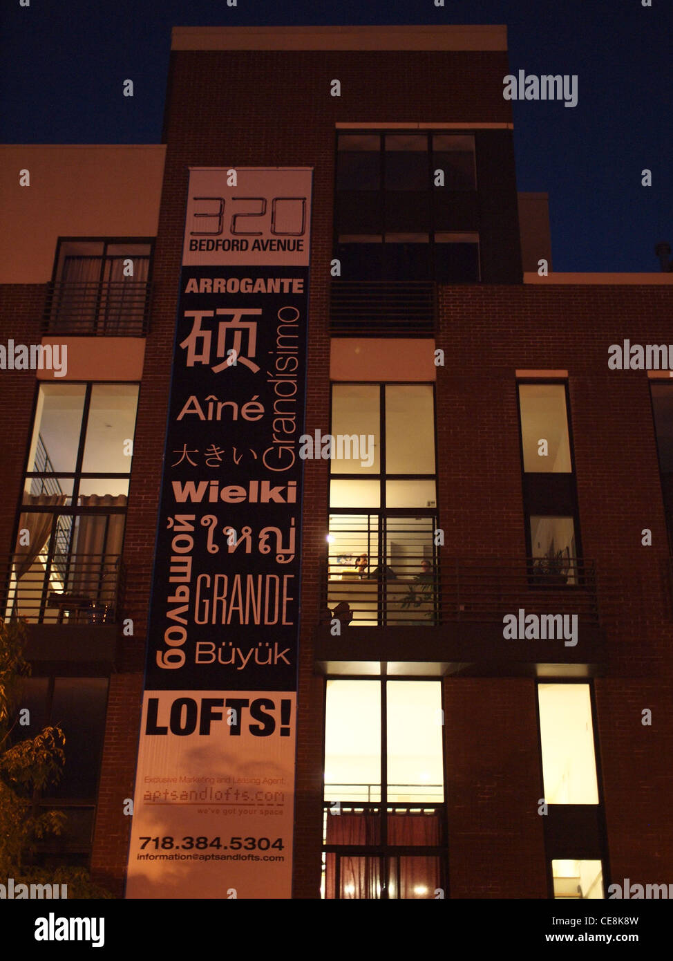 Advertising sign on residential loft building, Brooklyn, New York Stock ...
