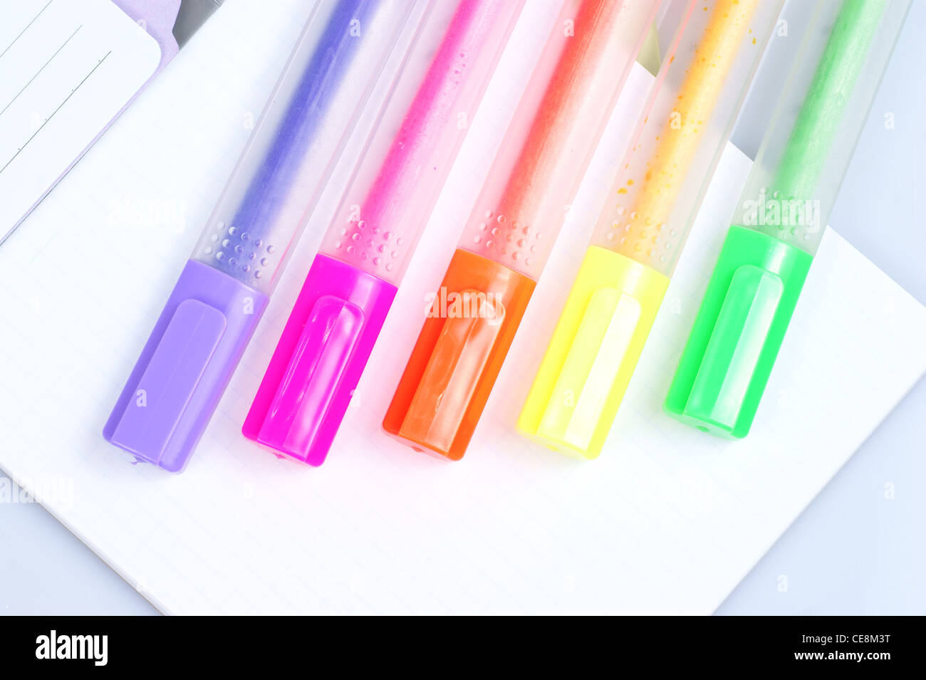 Colorful markers over a white background Stock Photo - Alamy