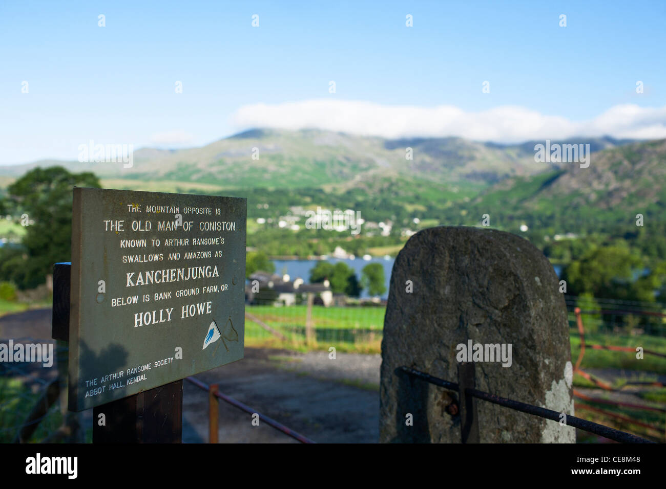 A sign commemorates Swallows and Amazons looking across to Coniston and ...
