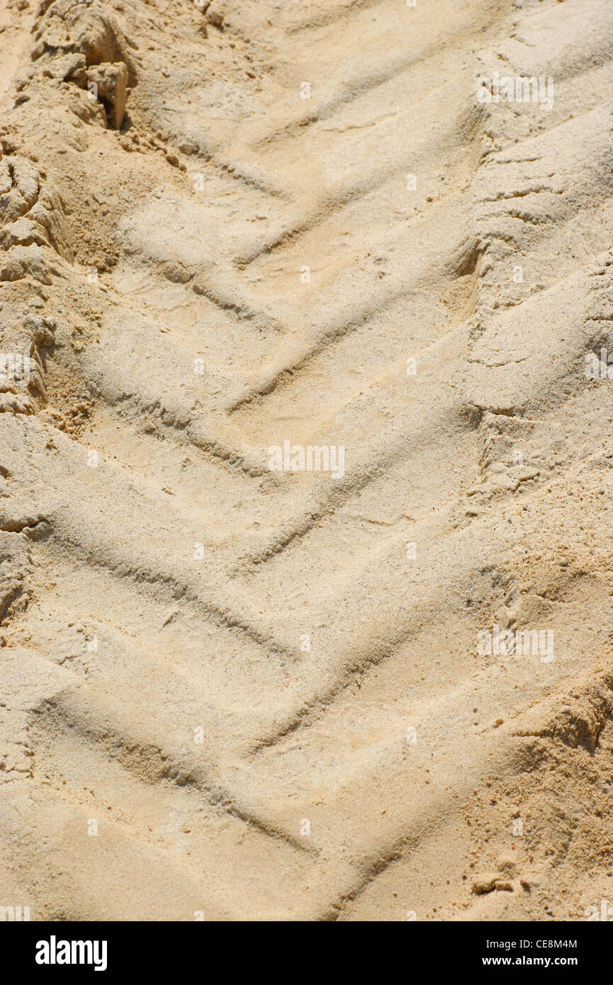 big tire tracks on the sand Stock Photo - Alamy