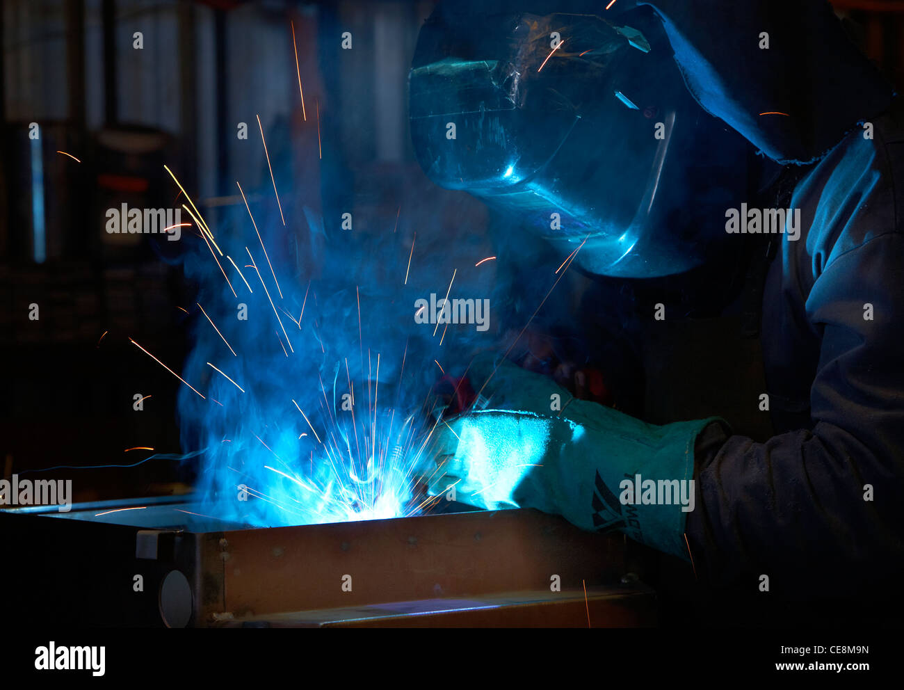 man welding in workshop Stock Photo - Alamy